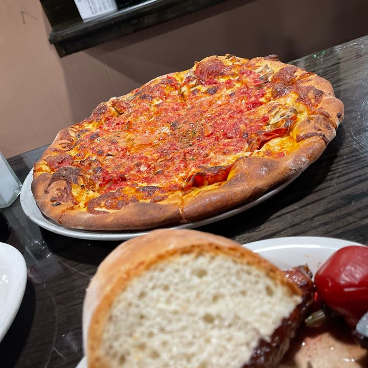 olizzle's Pizza Review at Santarpio's Pizza | One Bite